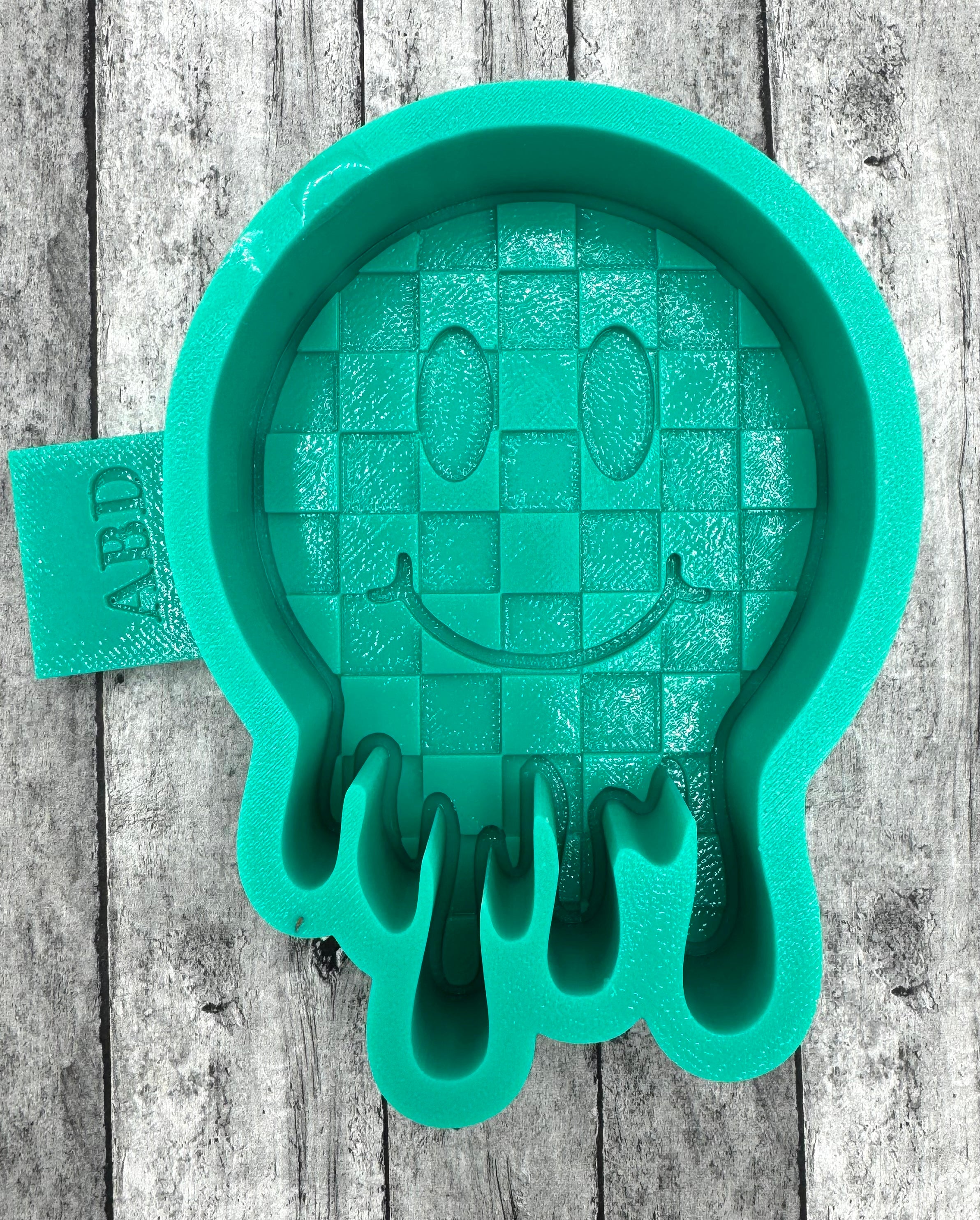 Checkered Melting Smiley Face Freshie Silicone Mold
